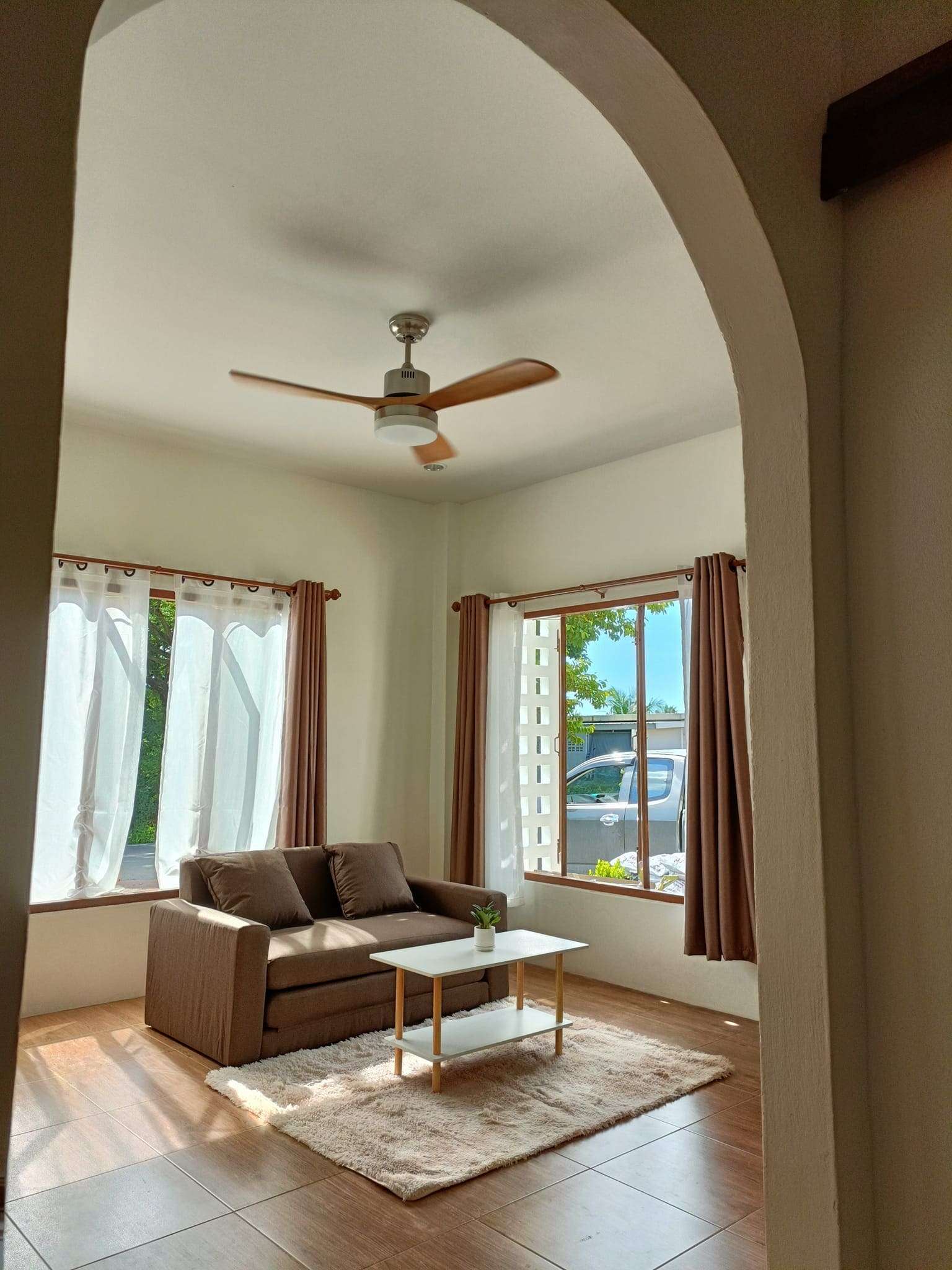 Tiny House Decorated with Simple Color Tones - Dream Tiny Living