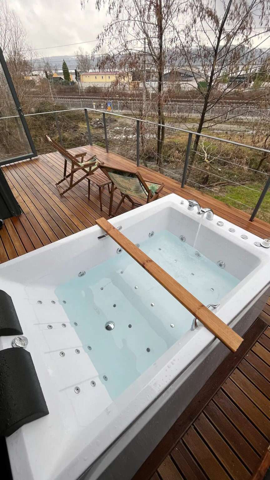 Tiny Container House with Jacuzzi and Lake View - Dream Tiny Living