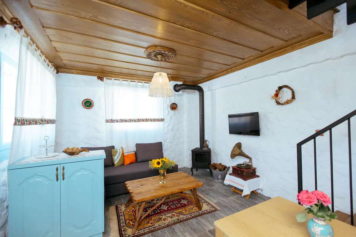 Stone Small House with Colorful Bay Window - Dream Tiny Living