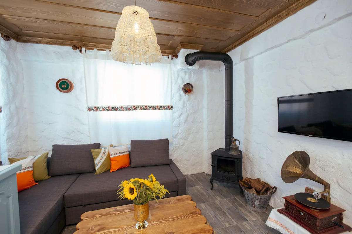 Stone Small House with Colorful Bay Window - Dream Tiny Living